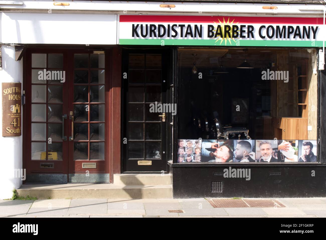 Kurdistan Barber Company hairdresser shop in historic Chichester Stock ...