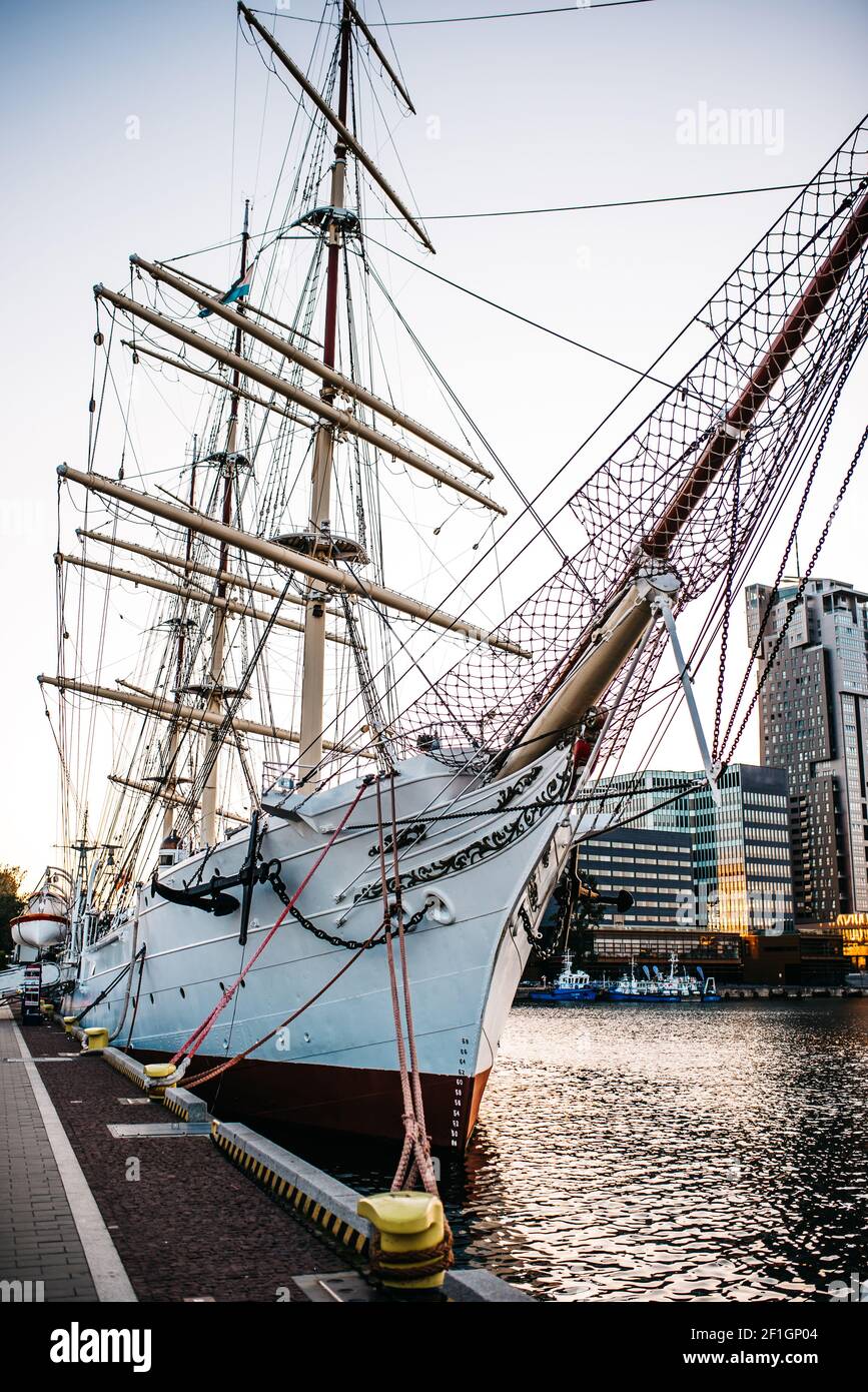 Old sailing ship, frigate at anchor in the port Stock Photo - Alamy