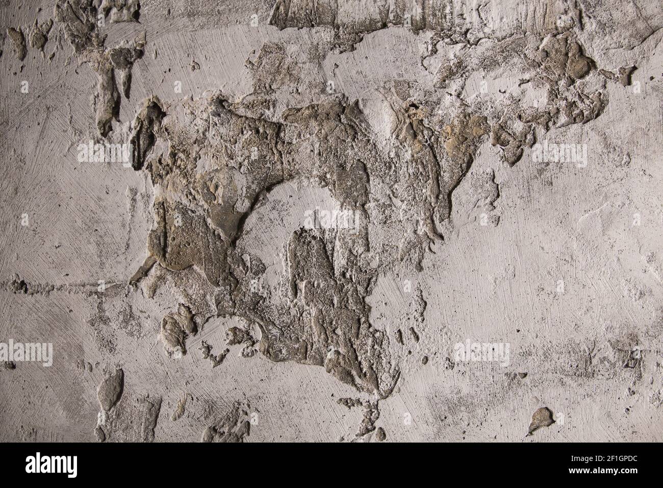 Cracked coarse plaster on the old wall. Close-up. Background Stock ...