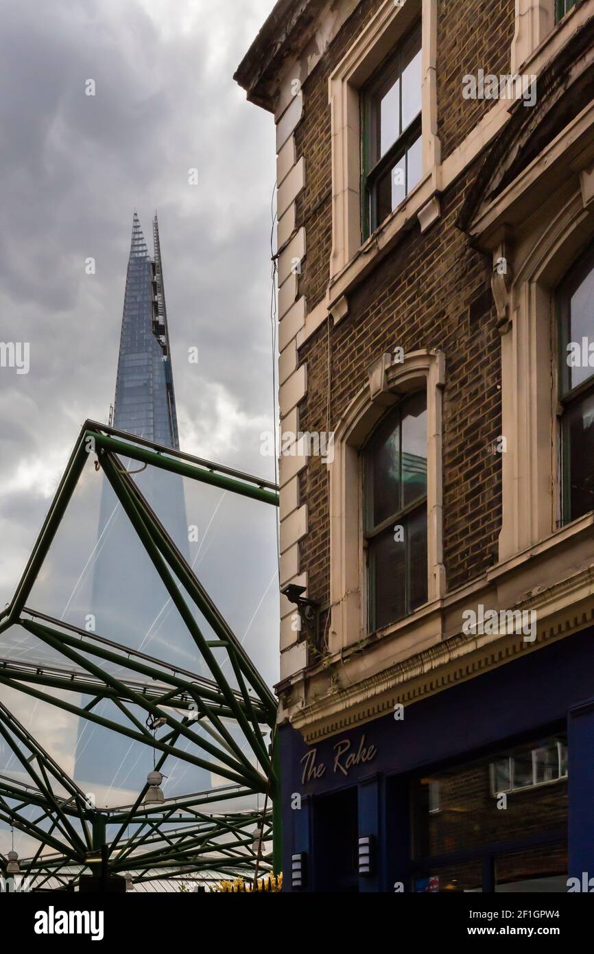 The old brick façade of The Rake bar, near Borough Market, contrasts ...