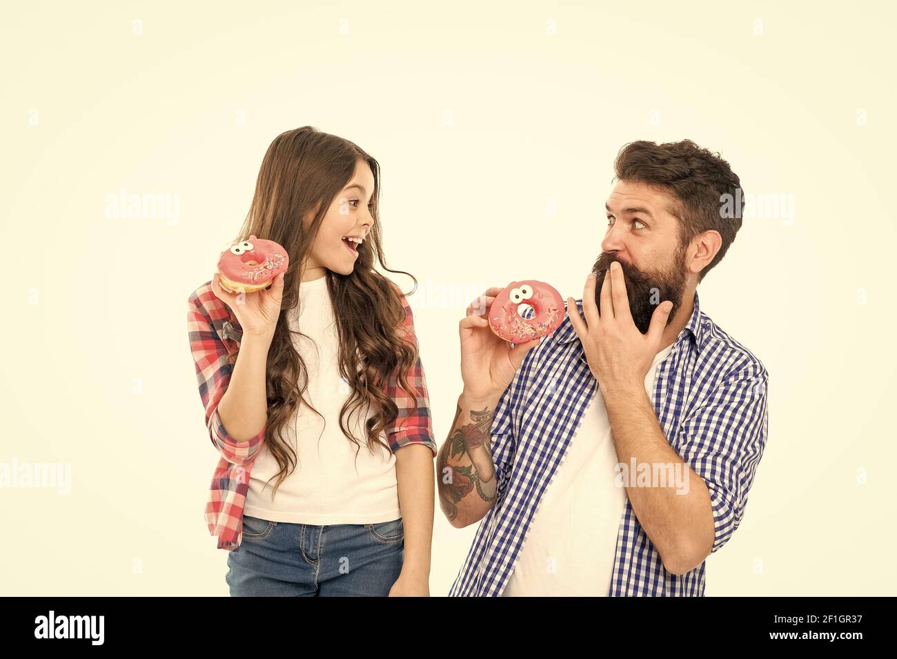 Donut care anymore. Happy family eat funny donuts isolated on white ...