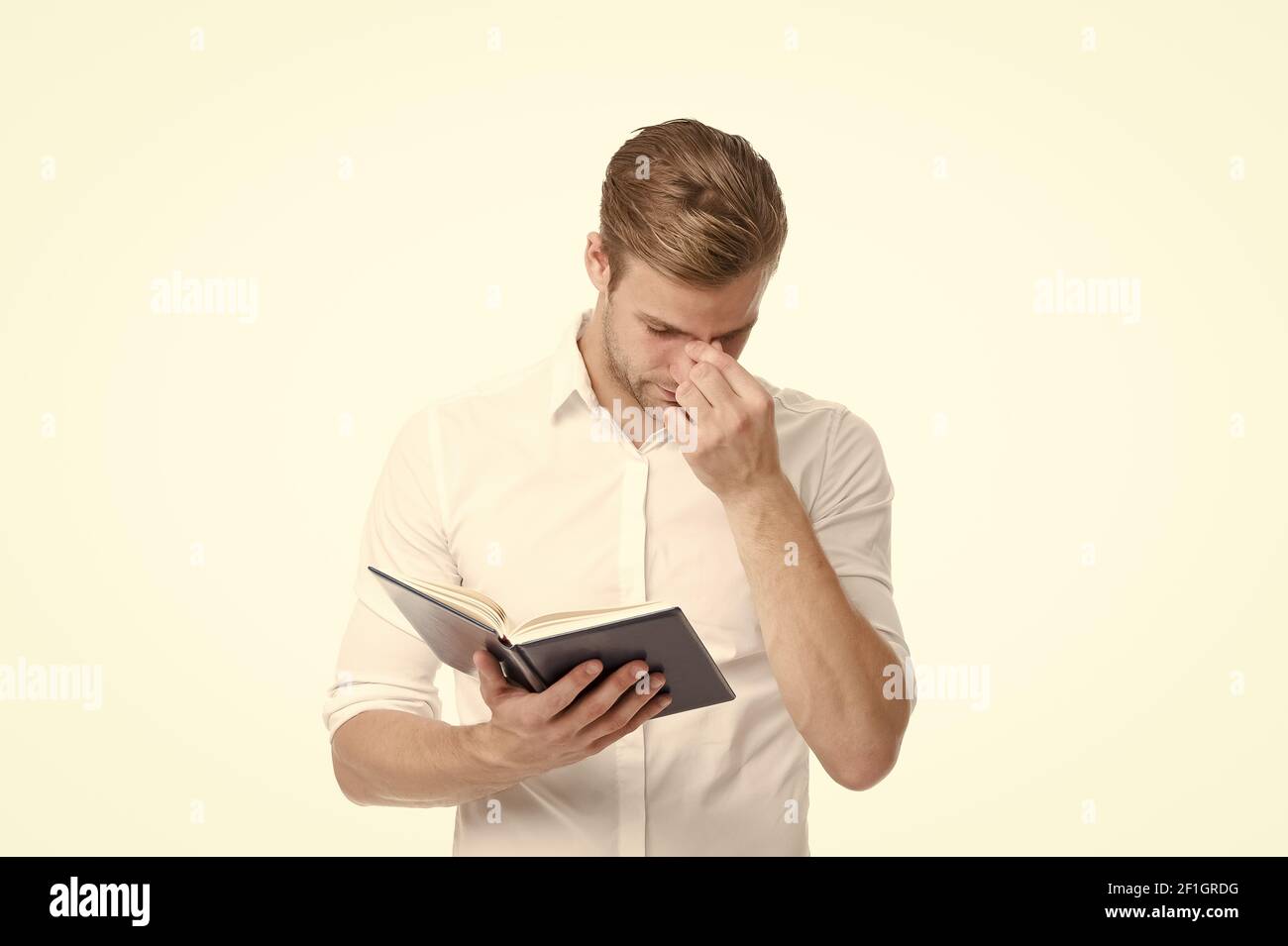 Tired eyes. Businessman hold book. Reading book. Find inspiration in ...