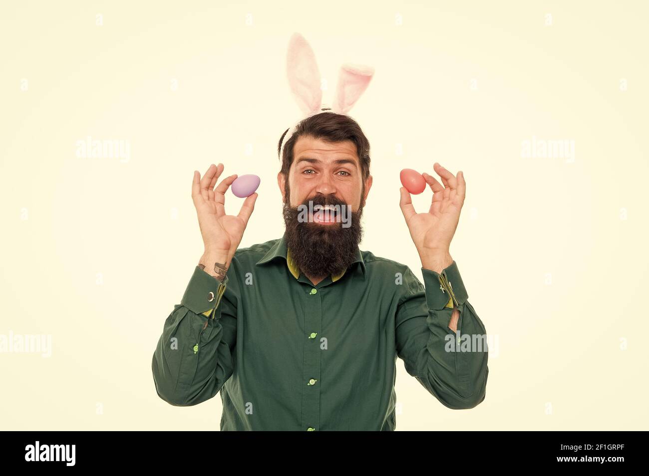 Celebration of feast of feasts. Bearded man hold paschal eggs. Happy ...