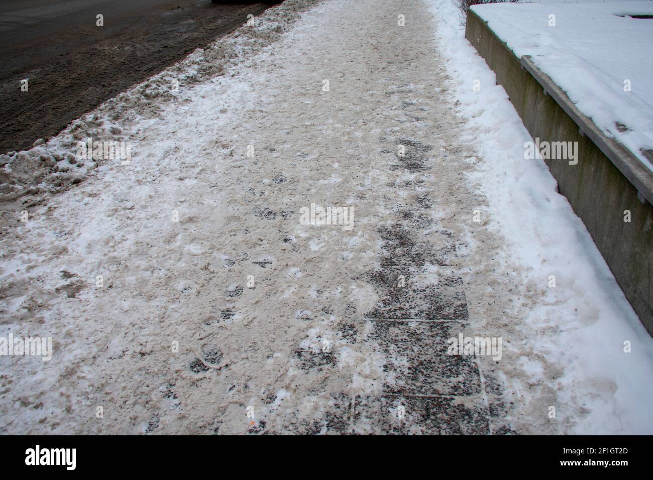 Not maintained icy path on Humboldt Campus in Berlin Stock Photo - Alamy