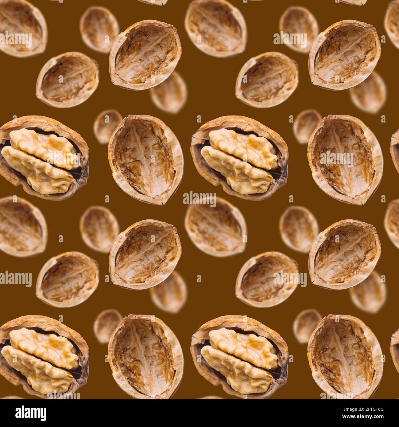Walnut seamless pattern on dark brown background. Open nut shell and ...