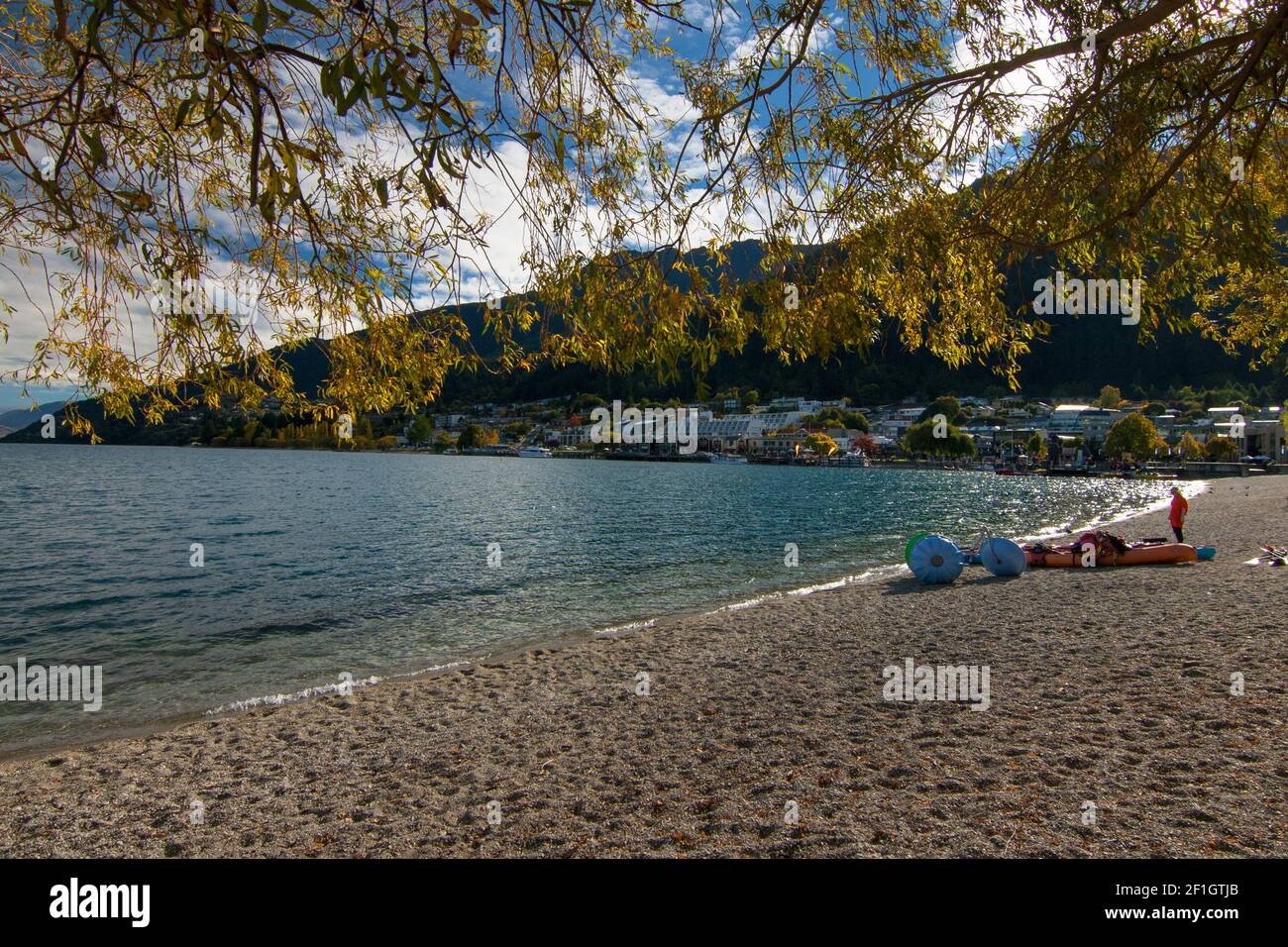Lake Wakatipu and the beach along Queenstown Bay, New Zealand Stock ...