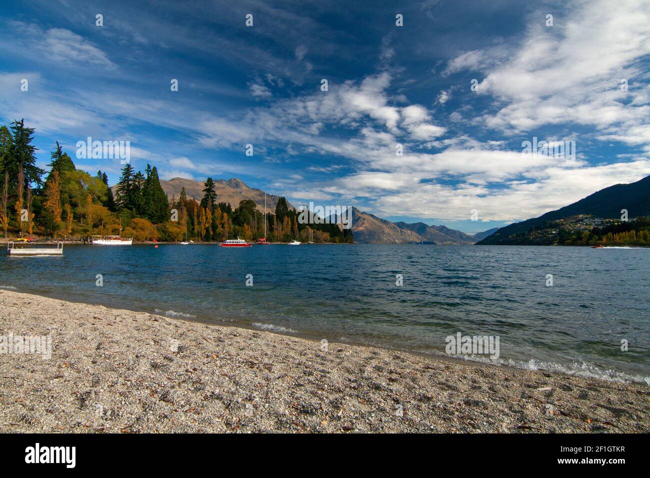 Queenstown Bay Beach with view of Cecil and Walter Peaks, Lake Wakatipu ...