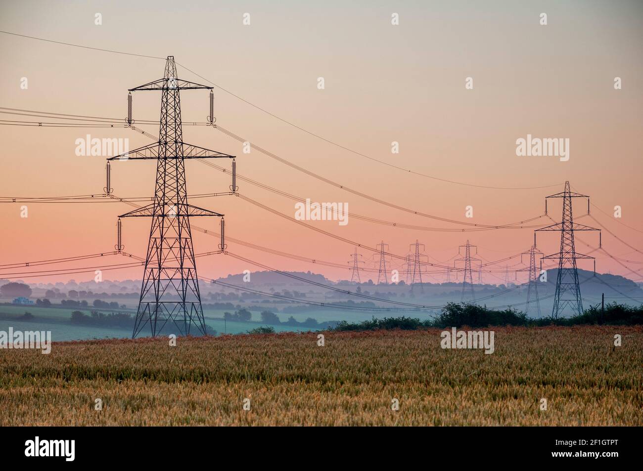 Electric power transmission lines landscape Stock Photo - Alamy