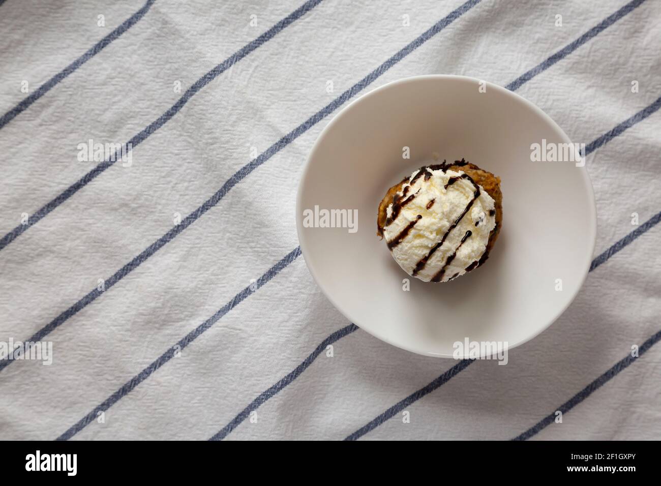 Homemade Chocolate Banana Bread Pudding with Ice Cream, top view. Flat ...
