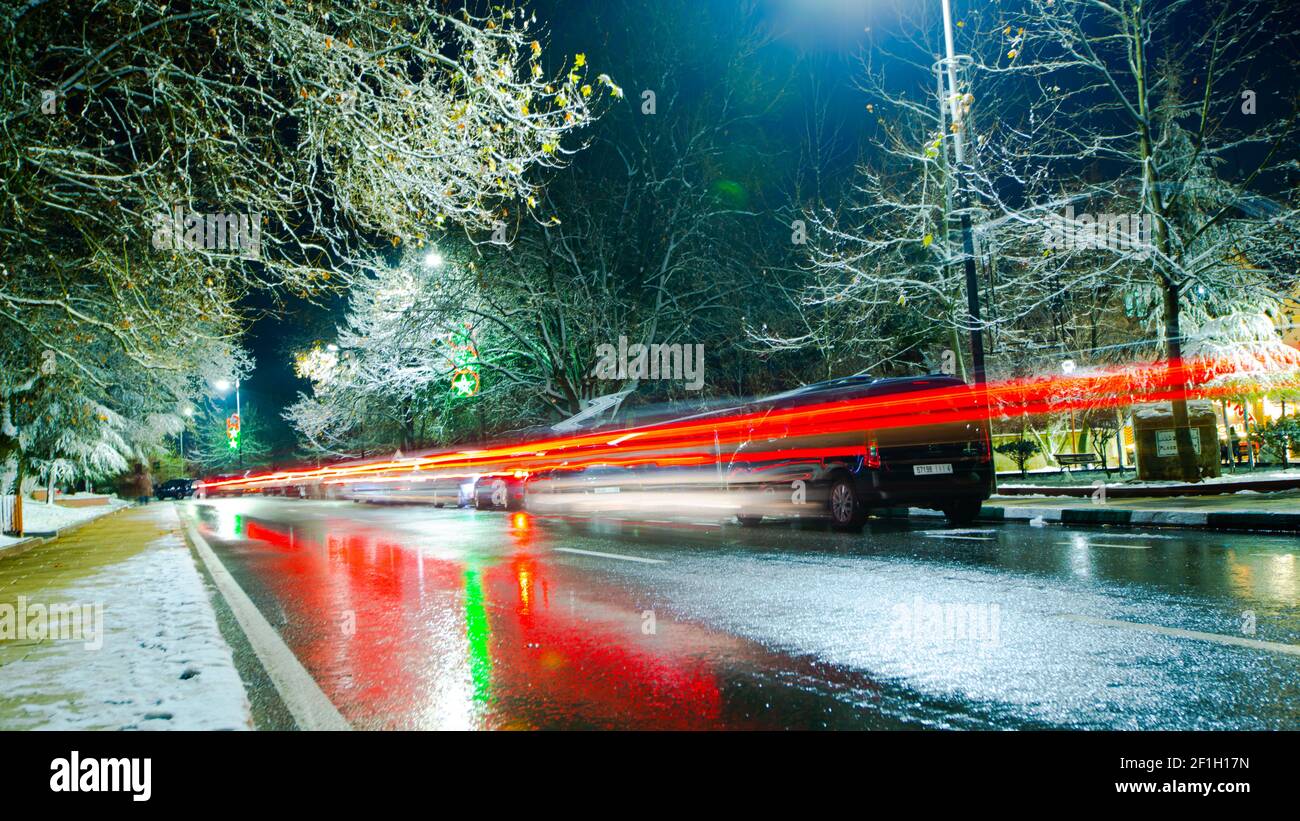Moving light at a snowy night Stock Photo - Alamy