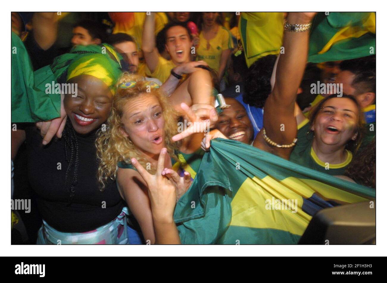 Brazil fans in Salsa Bar in London celebrate their win over England in ...