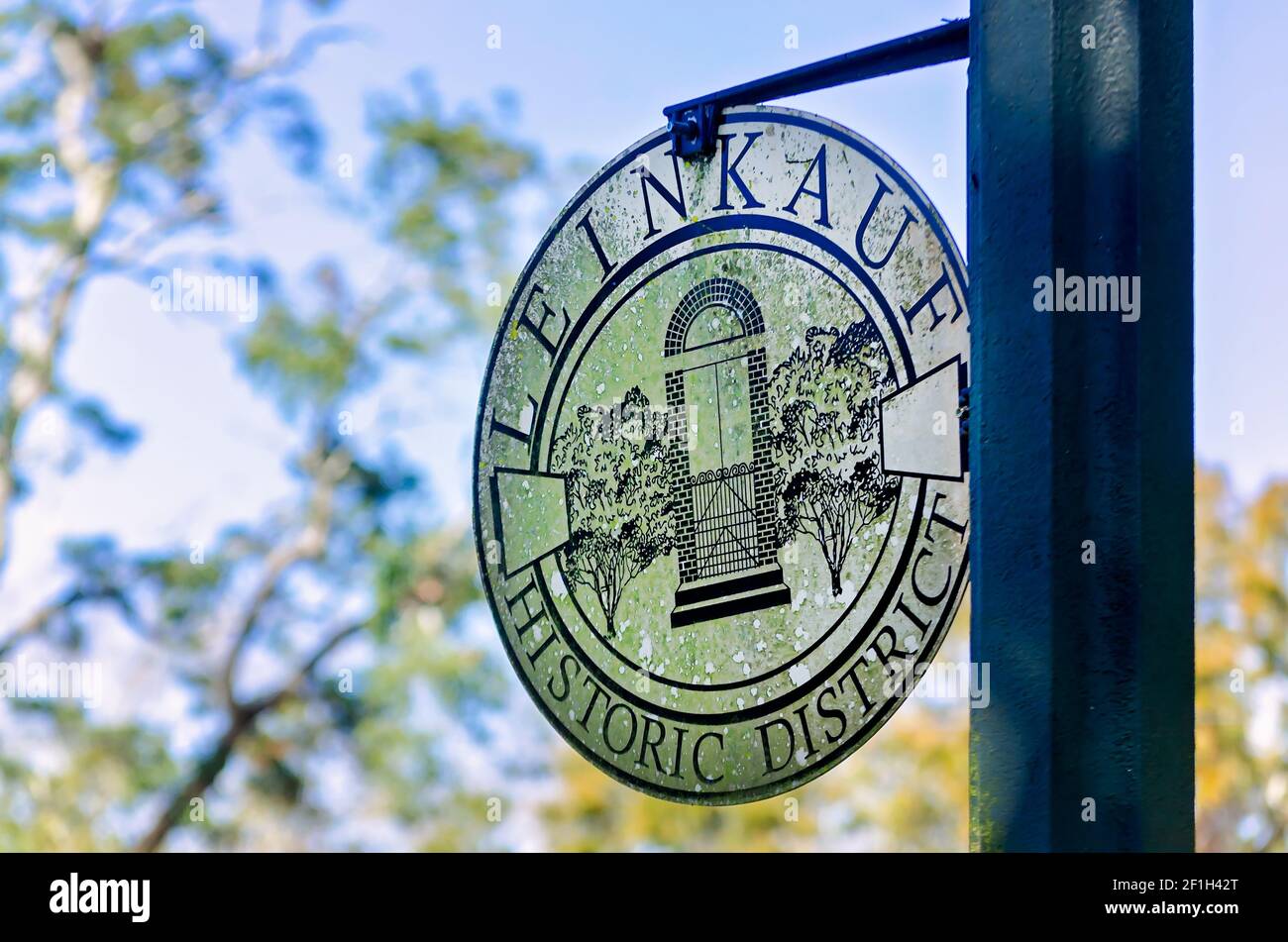 A sign hangs on a lamp post in the Leinkauf Historic District, March 6 ...