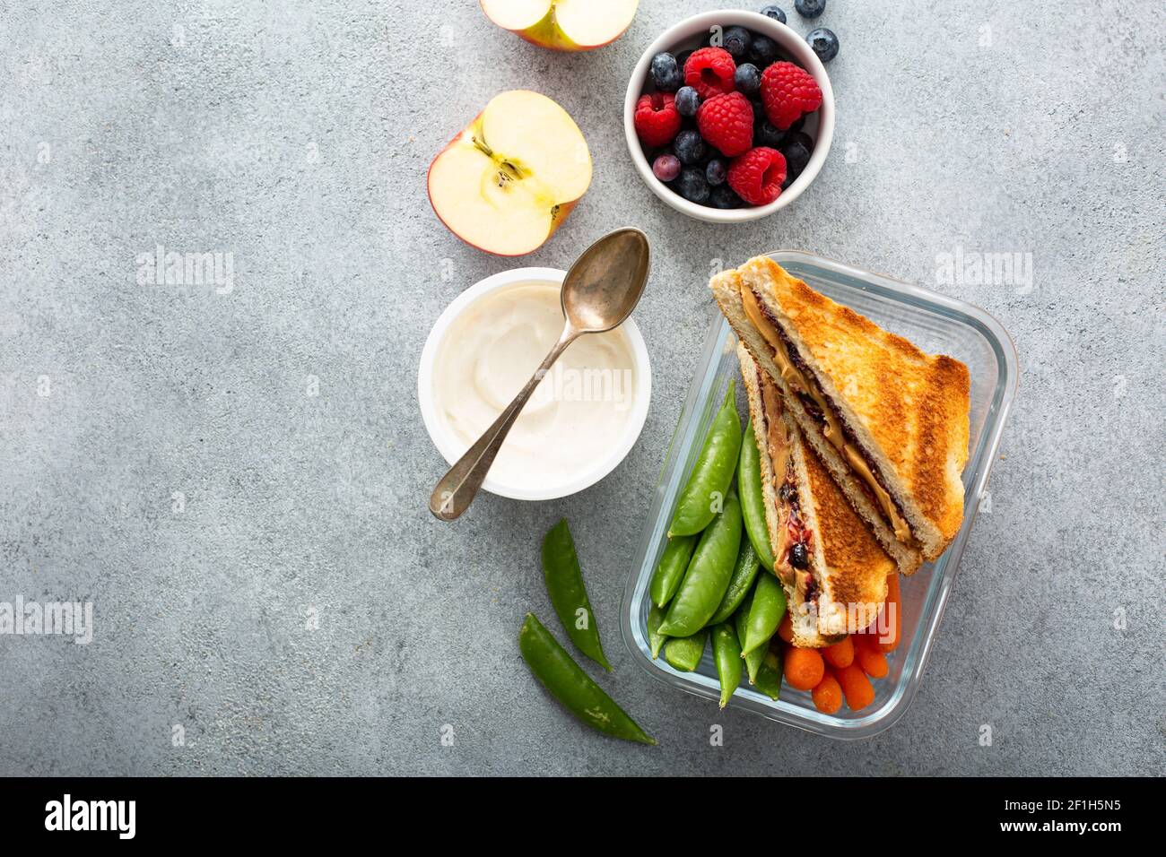 Lunch container with lunch to go for kids or adults Stock Photo - Alamy