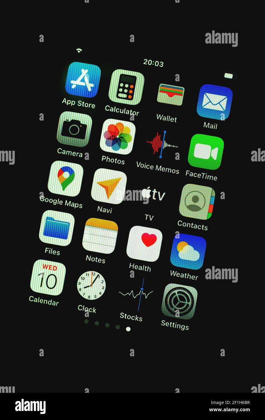 2020: Apple iPhone black smartphone showing a set of built-in app icons ...
