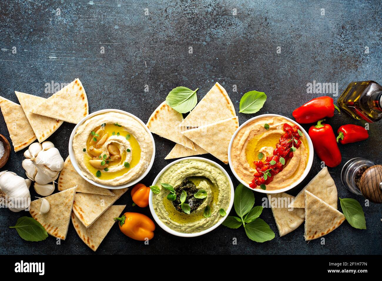 Hummus board with pita Stock Photo - Alamy
