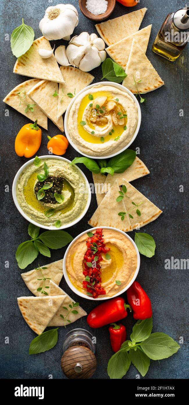 Hummus board with pita Stock Photo - Alamy