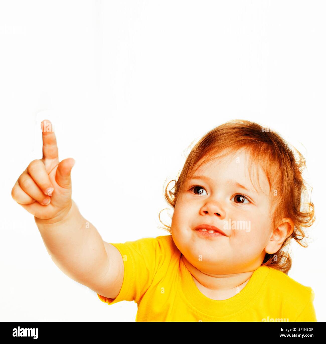 little cute baby girl pointing isolated on white Stock Photo - Alamy