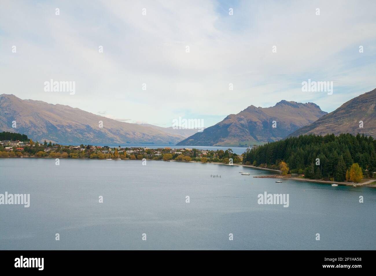 Queenstown New Zealand scenic view lookout with houses on lake Wakatipu ...