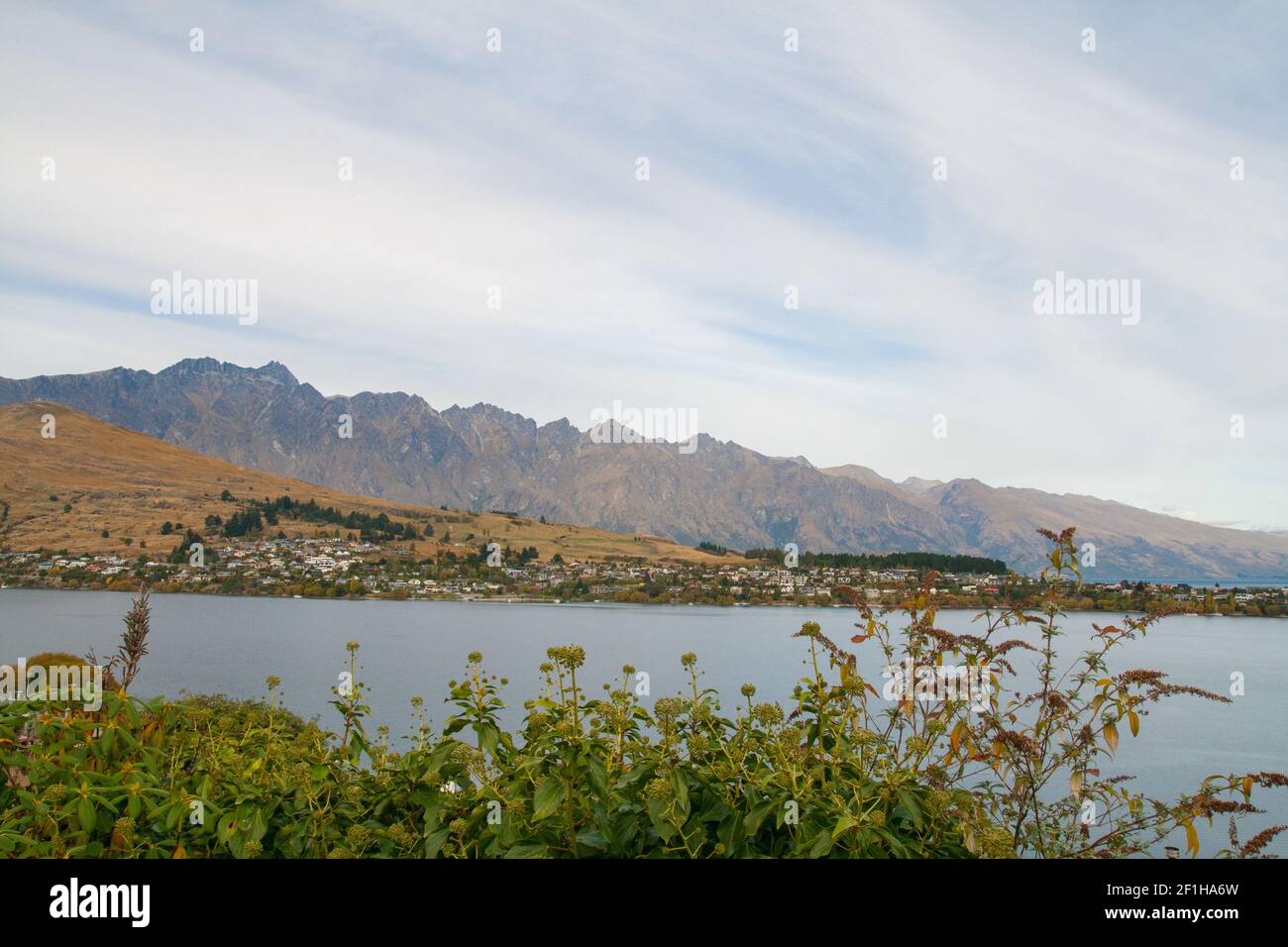 Queenstown New Zealand scenic view lookout with houses on lake Wakatipu ...
