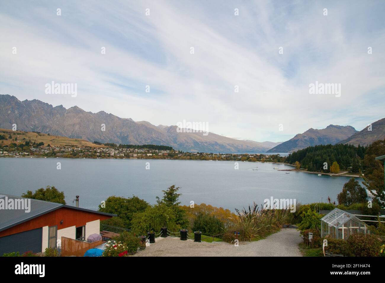 Queenstown New Zealand scenic view lookout with lake front houses on ...