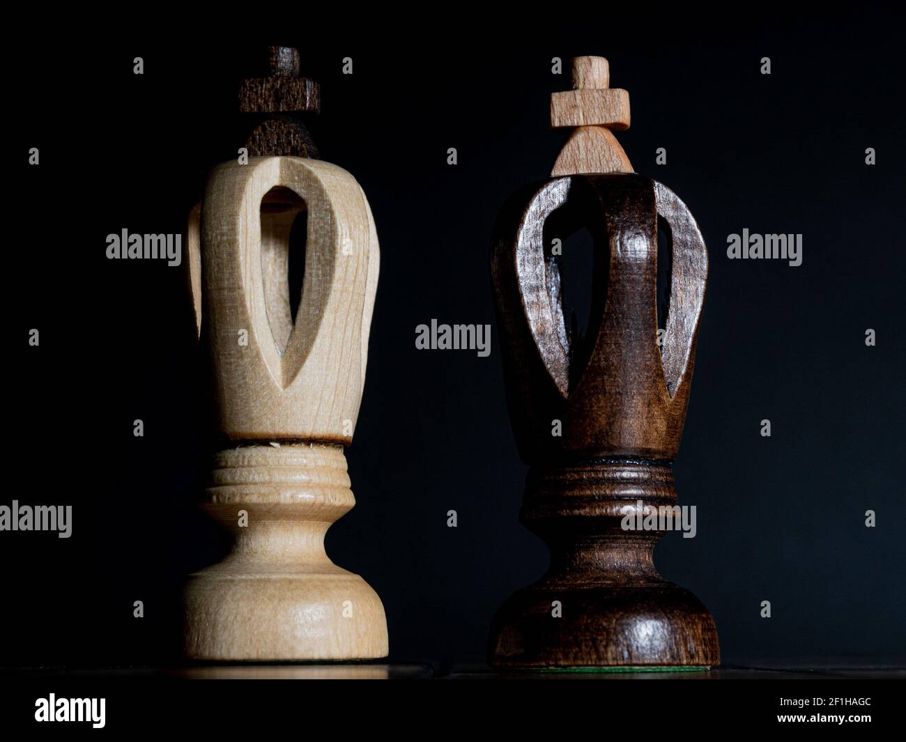 Black and white chess kings facing each other. Low key photography ...