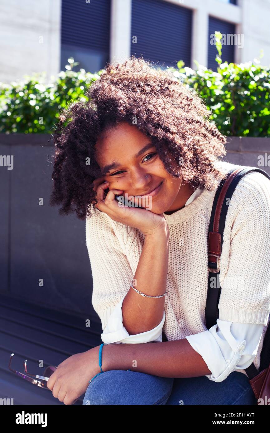 Young Pretty African Girl Posing Cheerful On City Background Lifestyle