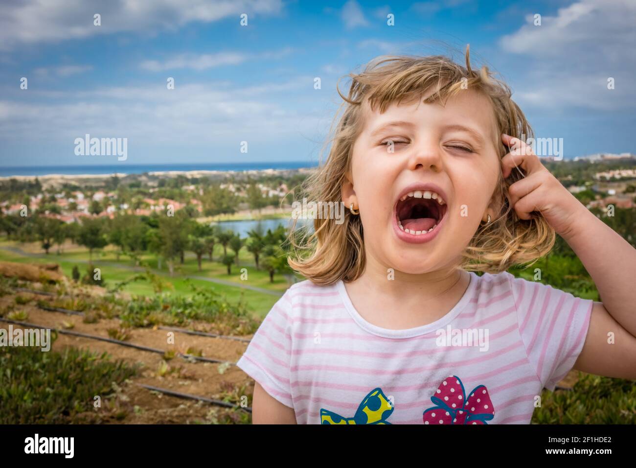 Happy girl shouting Stock Photo - Alamy