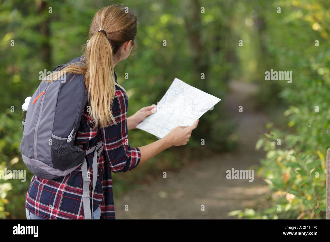 woman hiker attractive adventure wilderness holding map Stock Photo - Alamy