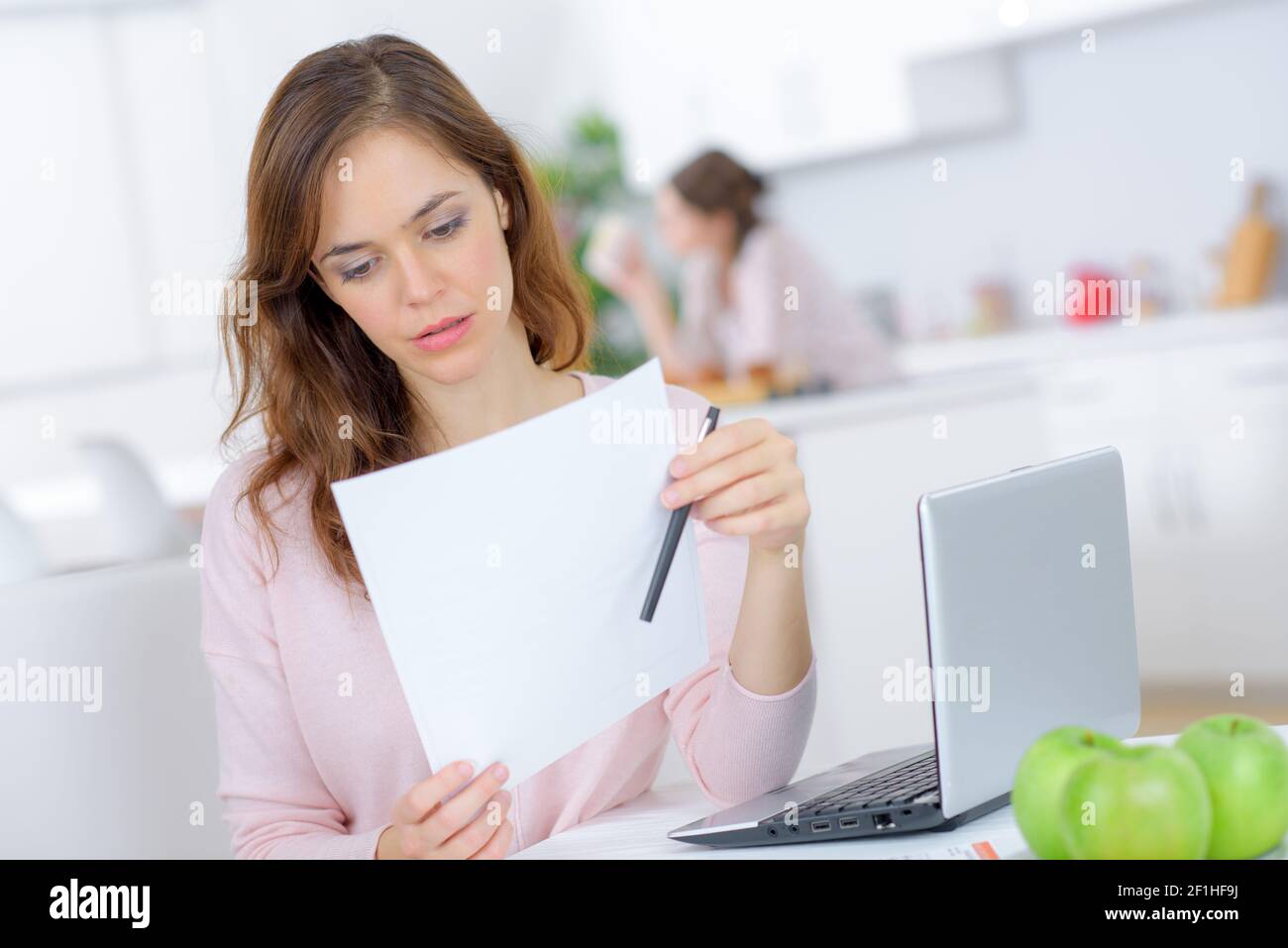 a woman has received a notice Stock Photo - Alamy