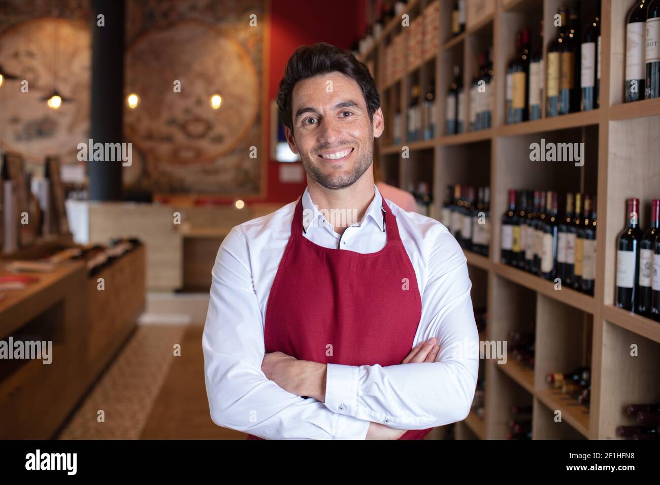 portrait of handsome sommelier in cellar Stock Photo - Alamy