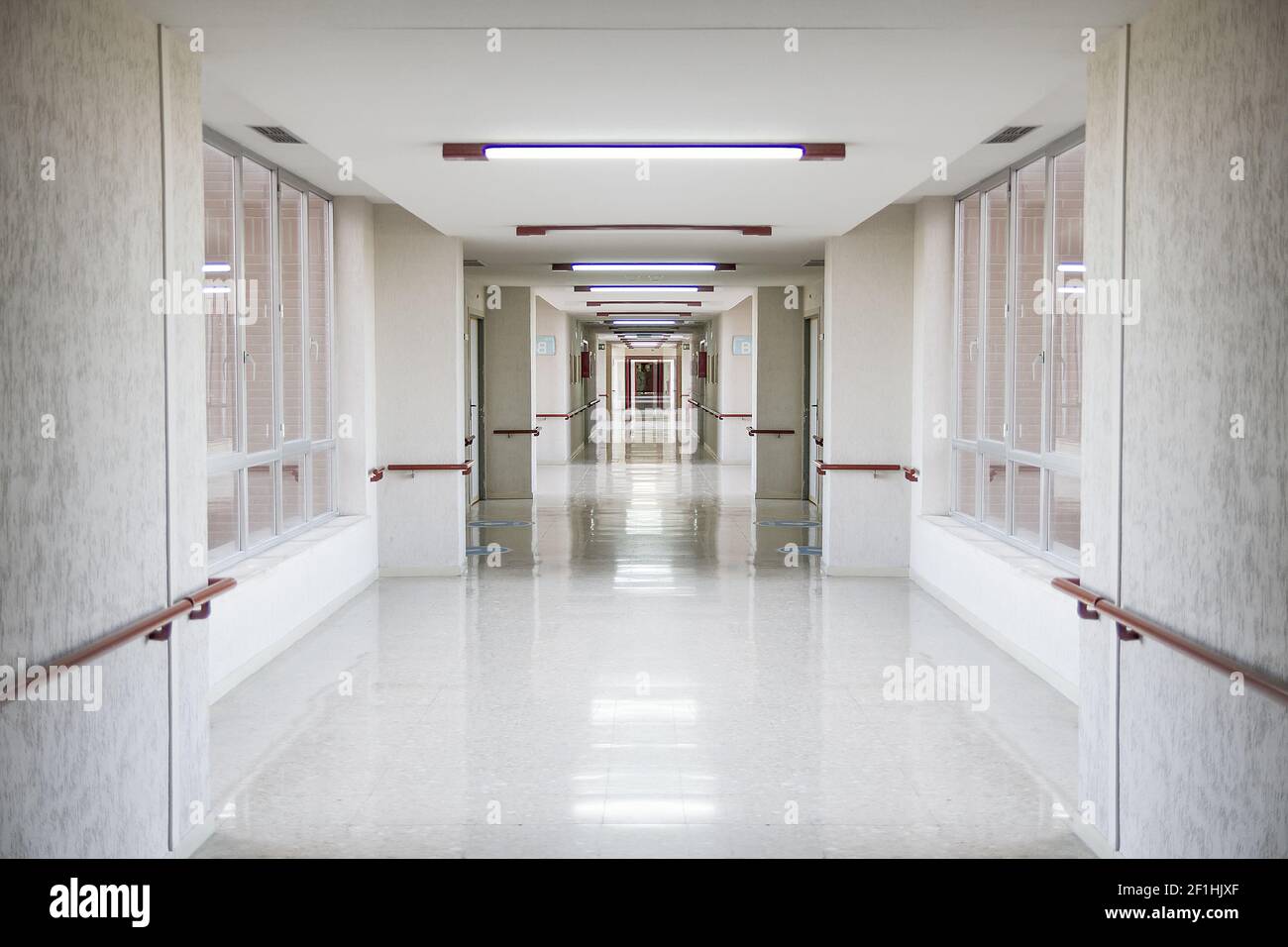 White hospital corridor, clean and hygienic space Stock Photo - Alamy