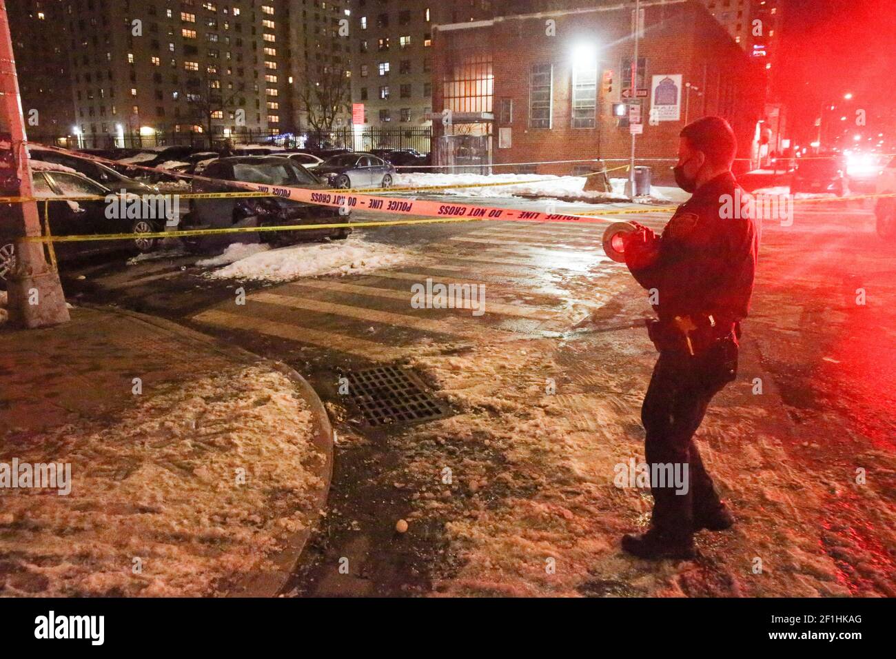 USA, New York City, NY - NYPD police officer at the scene of an ...