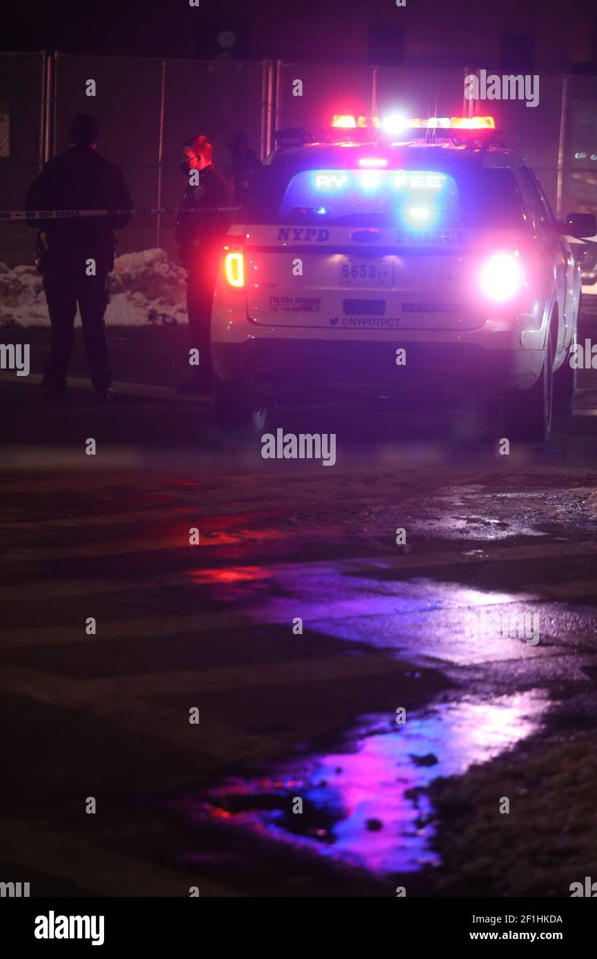 USA, New York City, NY - NYPD police officer at the scene of an ...