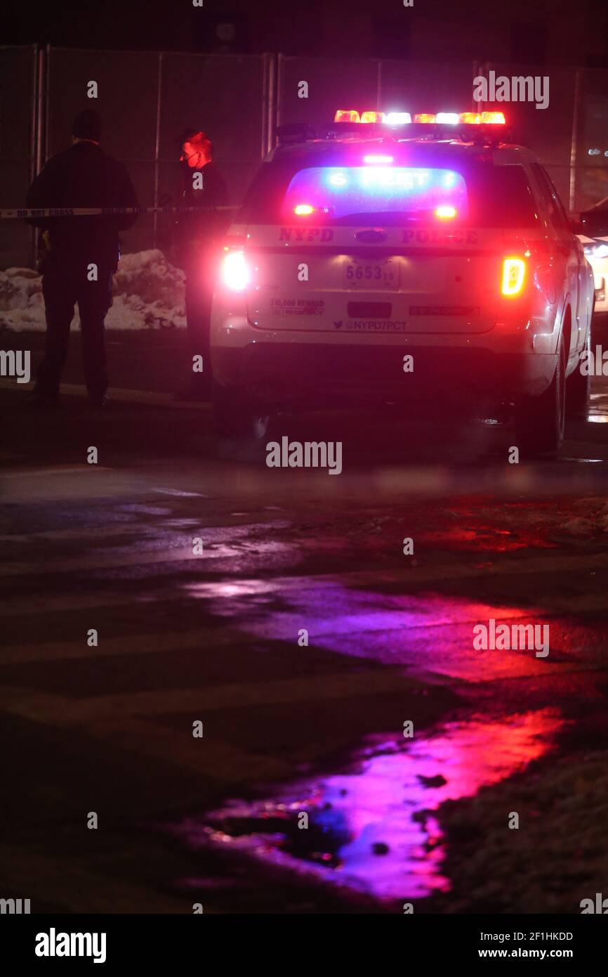 USA, New York City, NY - NYPD police officer at the scene of an ...