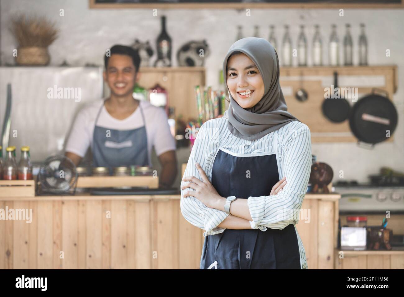 Successful muslim asian small business owner Stock Photo - Alamy