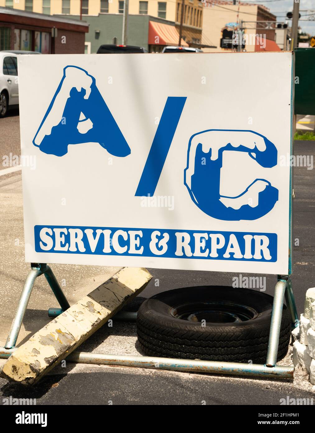White Sign Advertising For Shop Doing Air Conditioner Repairs Stock ...