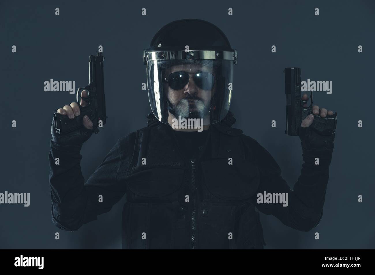 Protection, riot police signaling to colleagues with their hands. armed ...