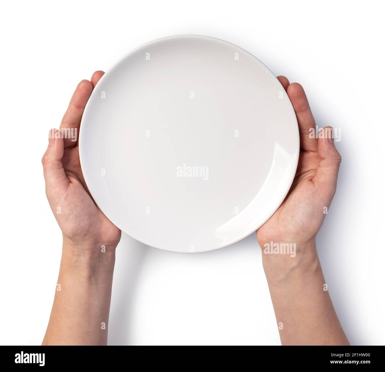 Female hand empty plate Cut Out Stock Images & Pictures - Alamy