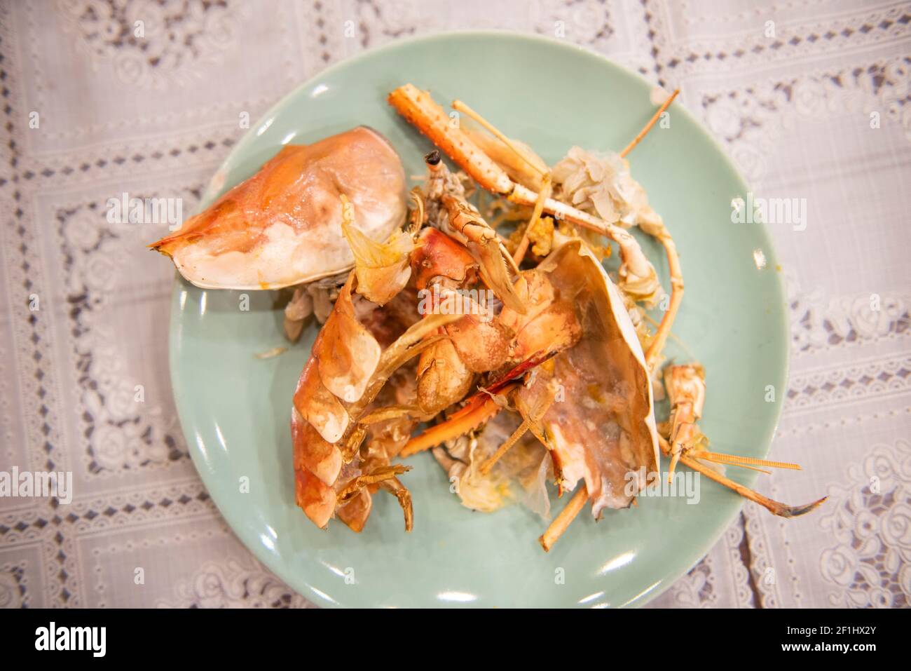 food waste plate with shellfish - Plate after eating seafood shrimp ...