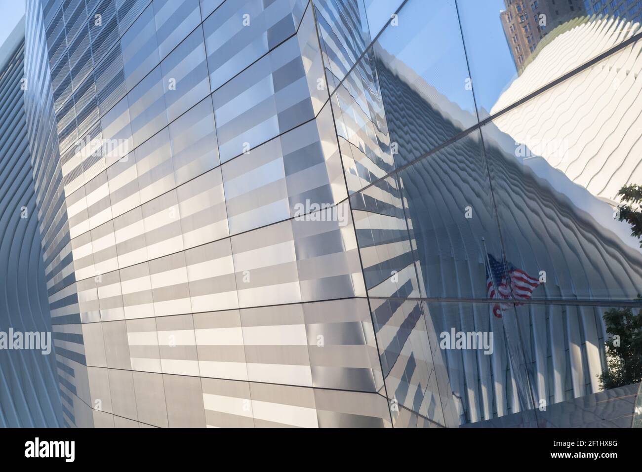 USA, New York City, NY - The Oculus is reflected on the exterior of 9/ ...