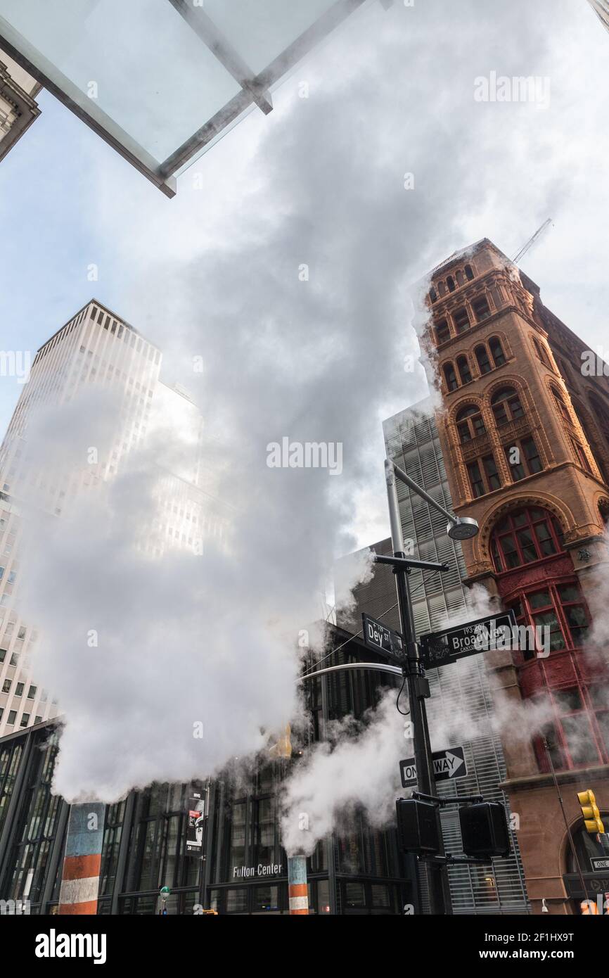 USA, New York City, NY - Steam rising from steam stacks on Broadway in ...