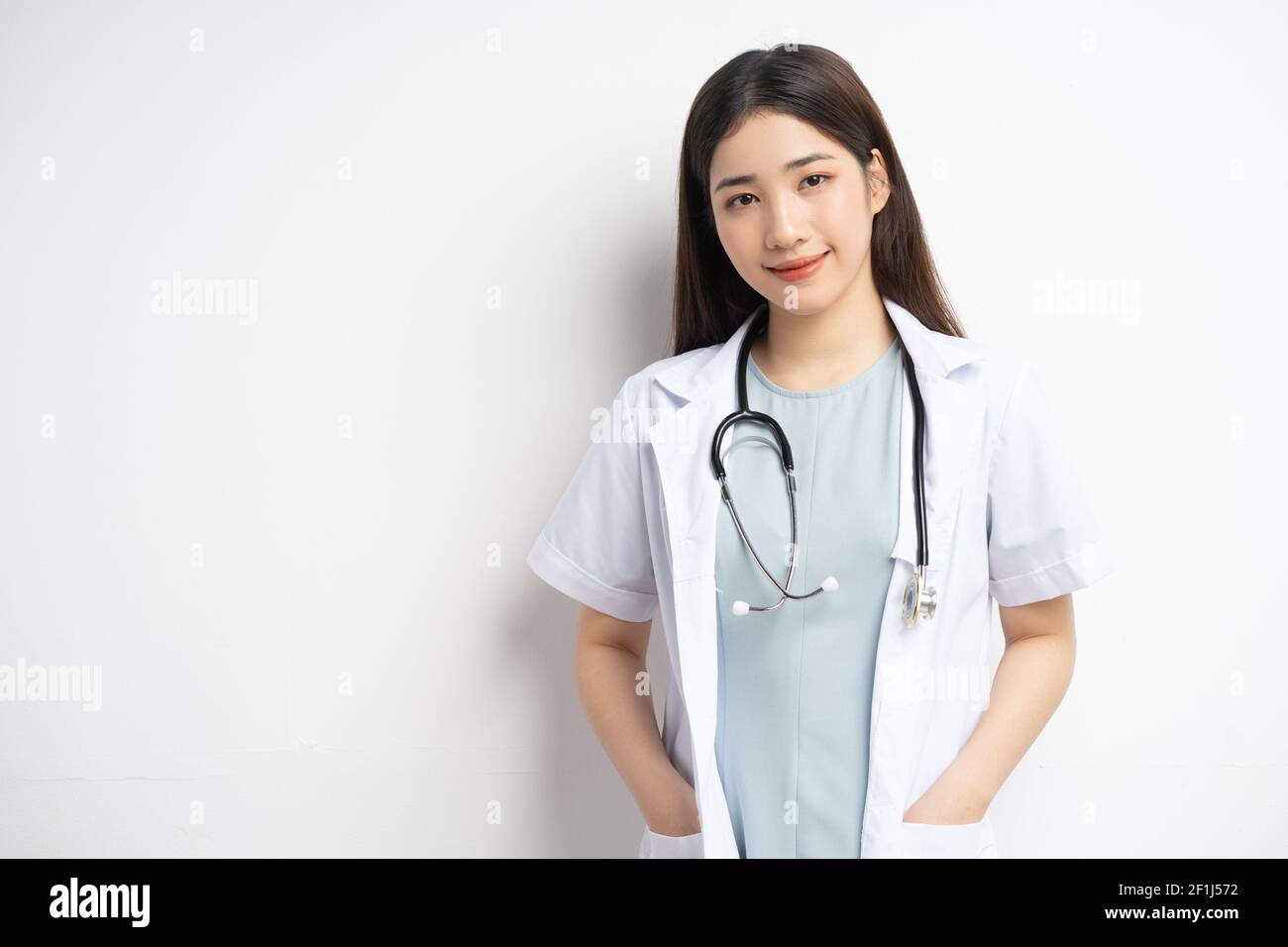 portrait asian female doctor smiling on white background Stock Photo ...