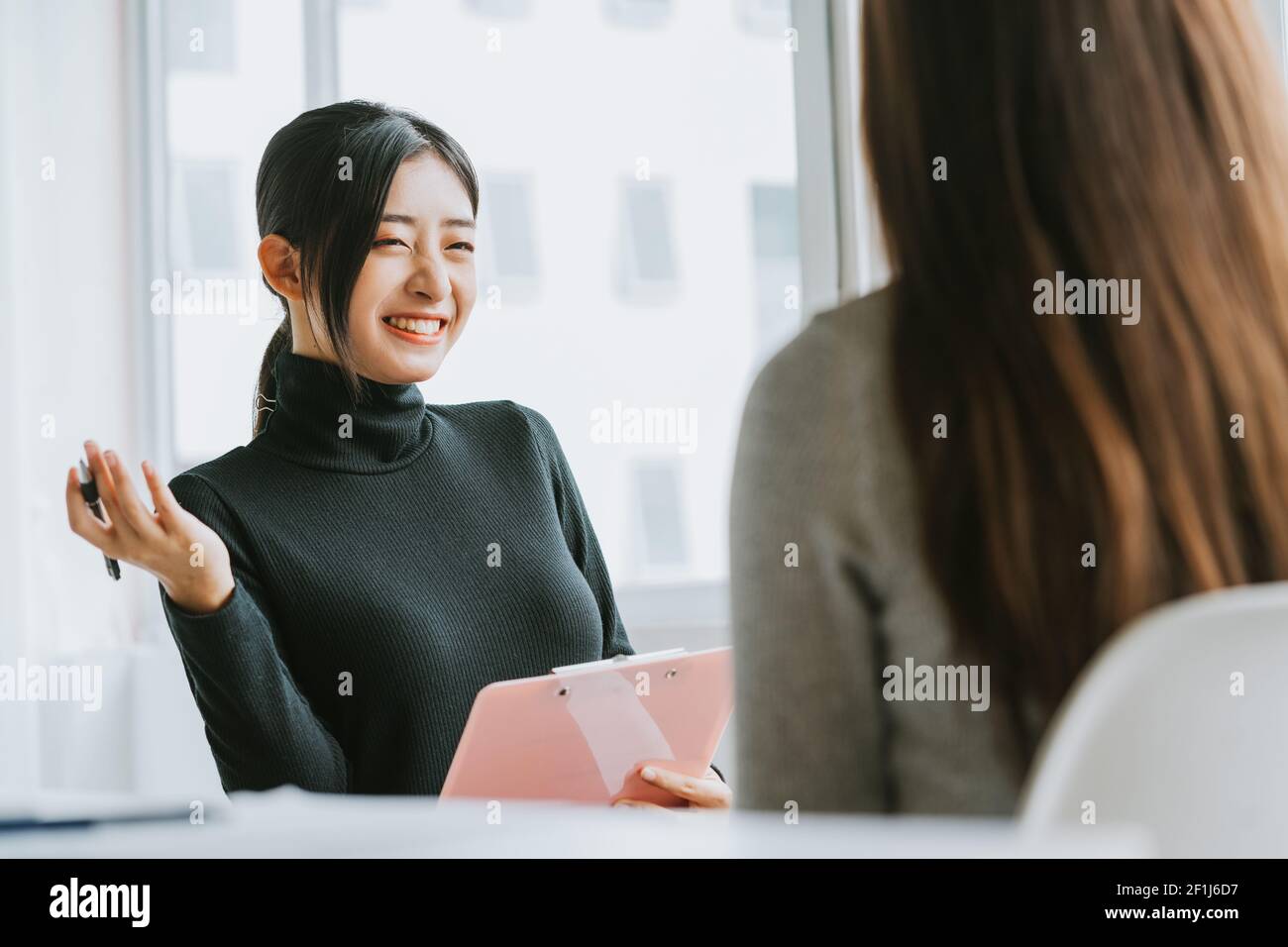 The recruitment officer is interviewing the candidate Stock Photo - Alamy