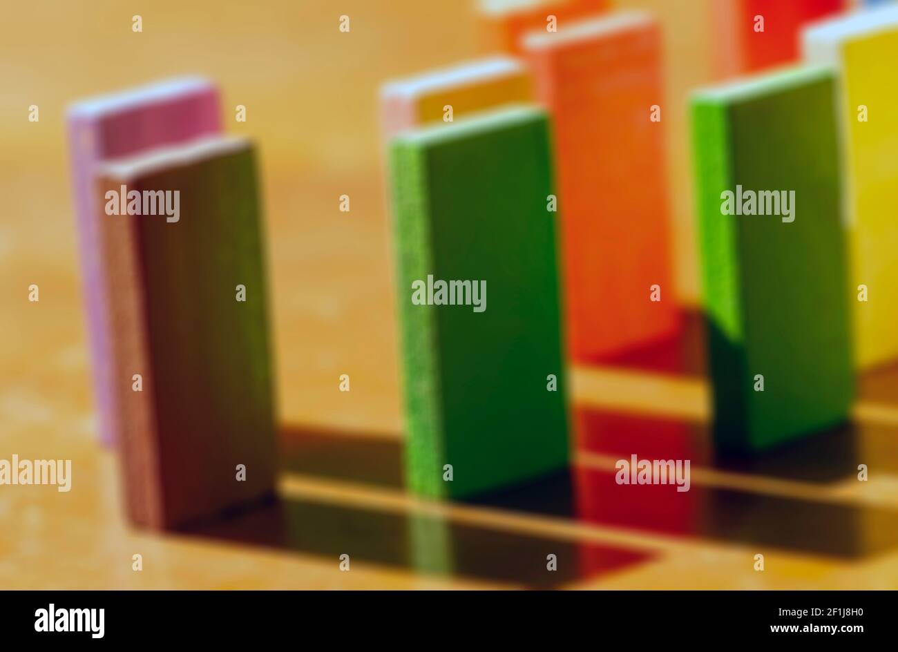 Defocused abstract background of colorful wooden toys, educational ...