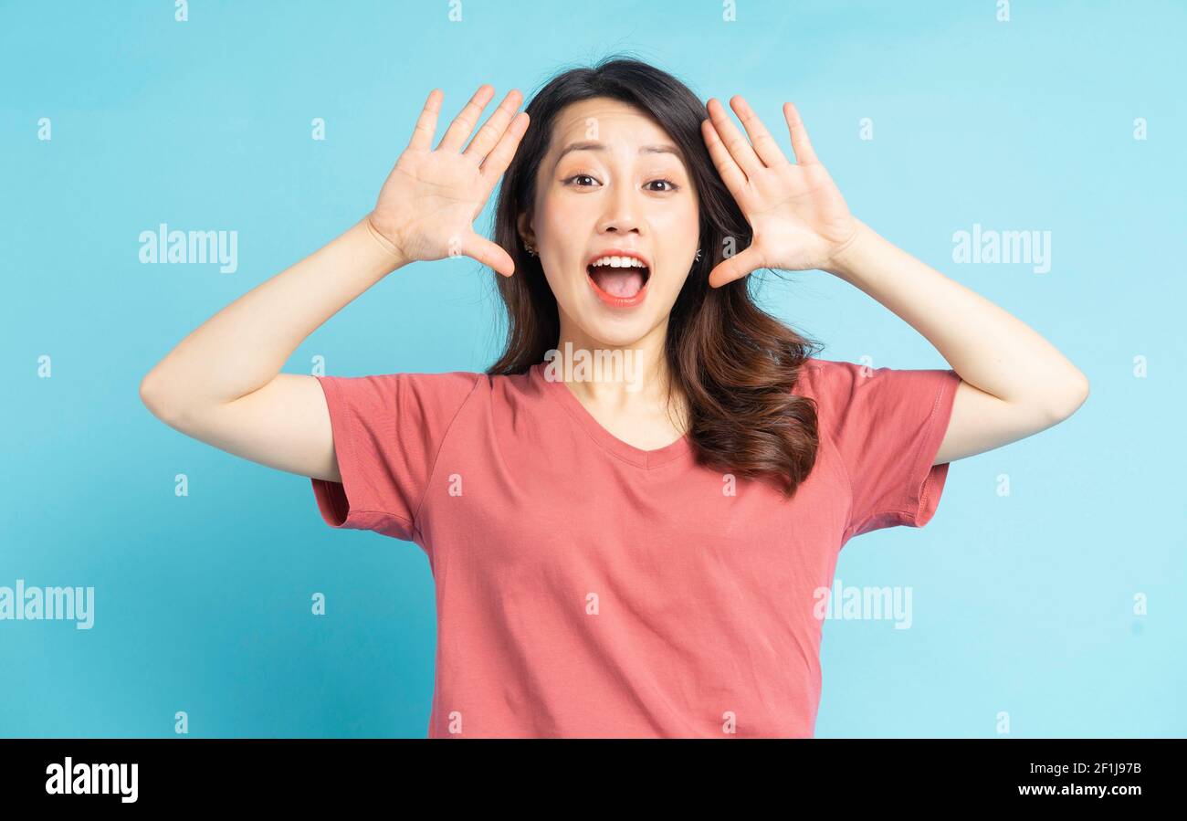 The beautiful Asian woman screamed with joy Stock Photo - Alamy