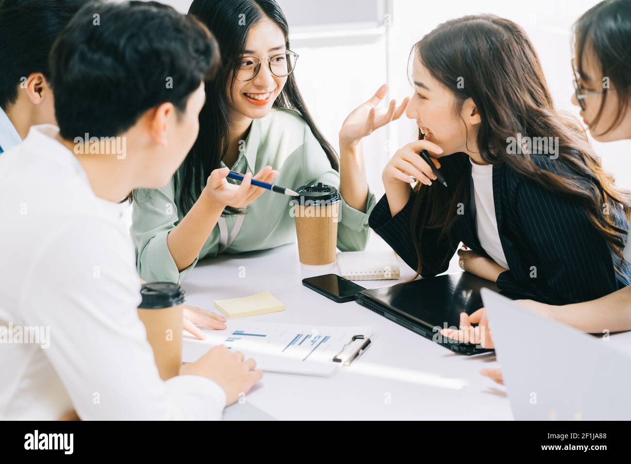 Team members discussing in business hi-res stock photography and images ...