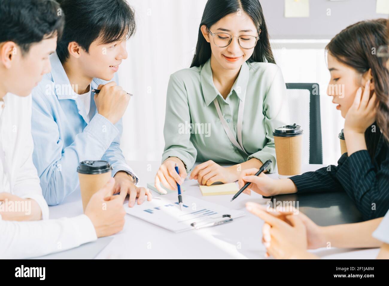 The business team members are discussing next month's plans together ...