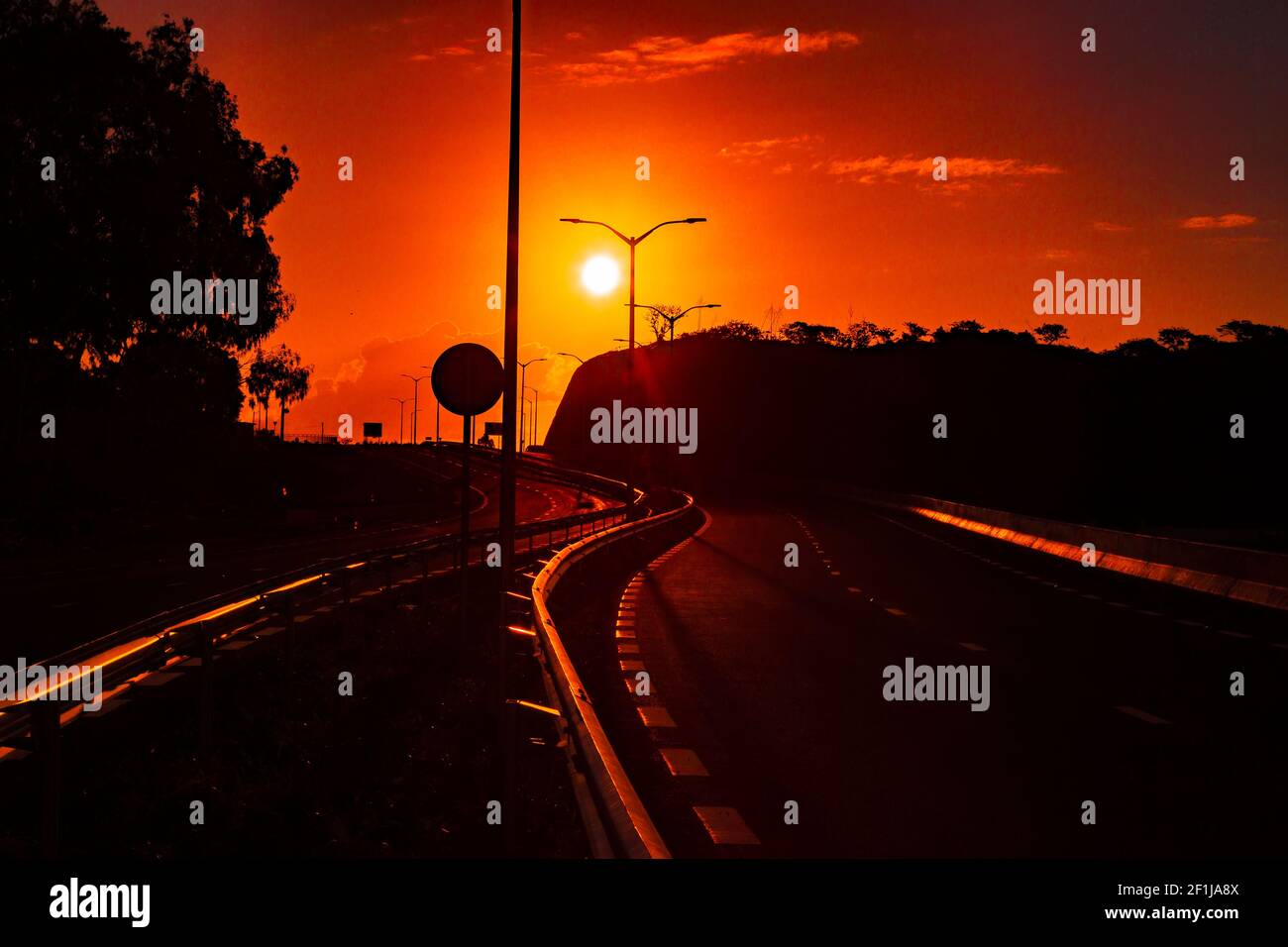 Highway sunset yellow hi-res stock photography and images - Alamy