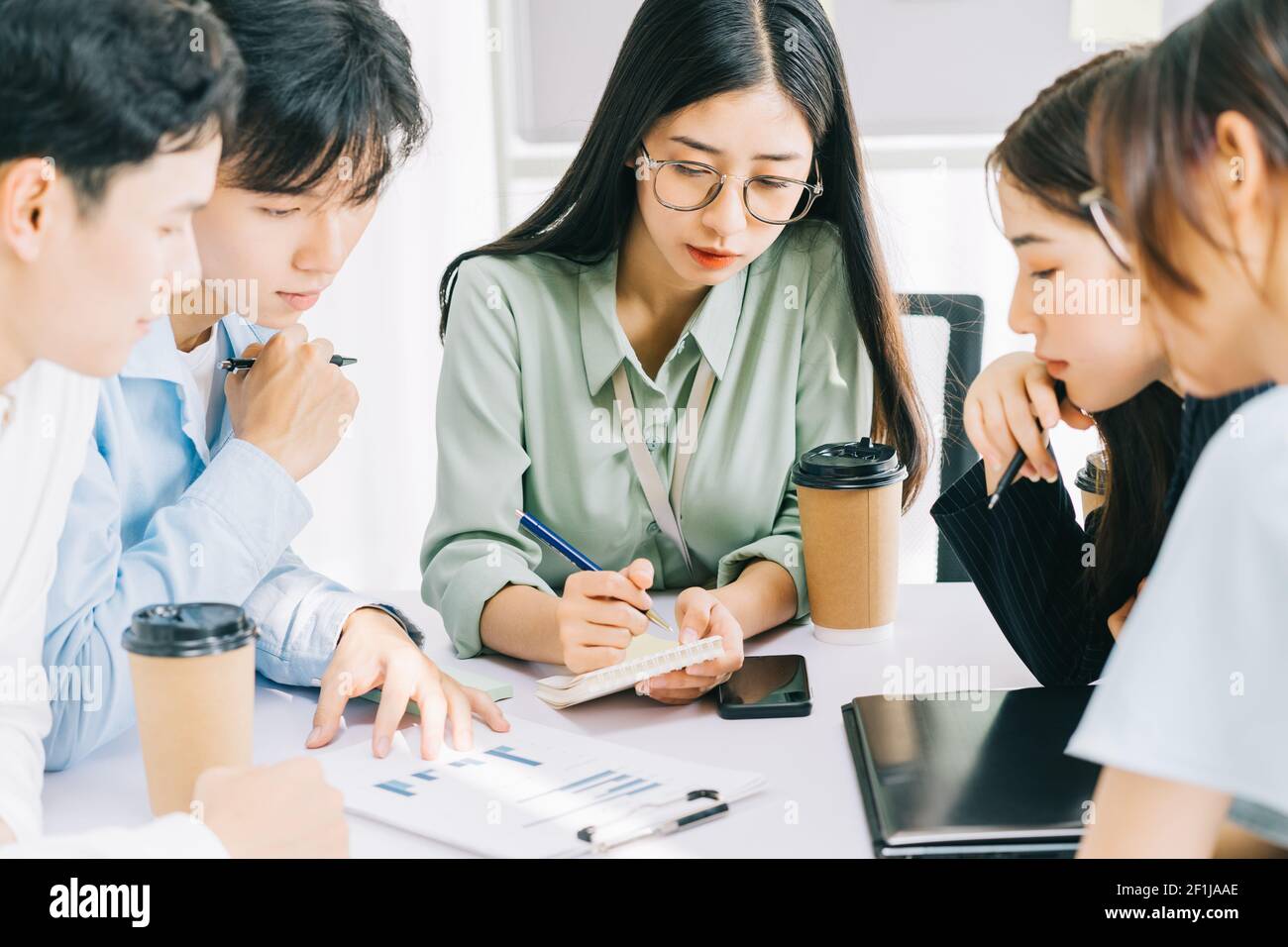 The business team members are discussing next month's plans together ...