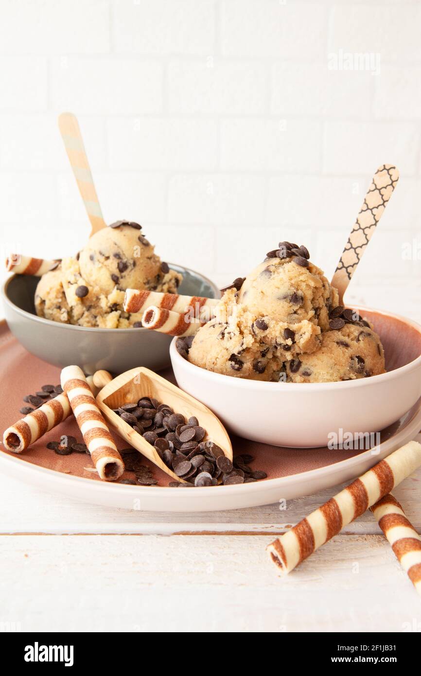 Edible biscuit dough with chocolate almond Stock Photo - Alamy